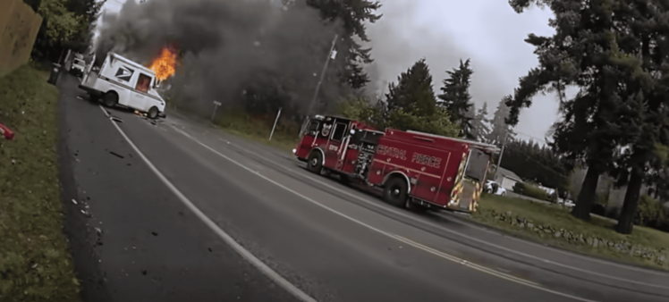 Deputy, Good Samaritan Rescue Driver From Burning Mail Truck After Crash